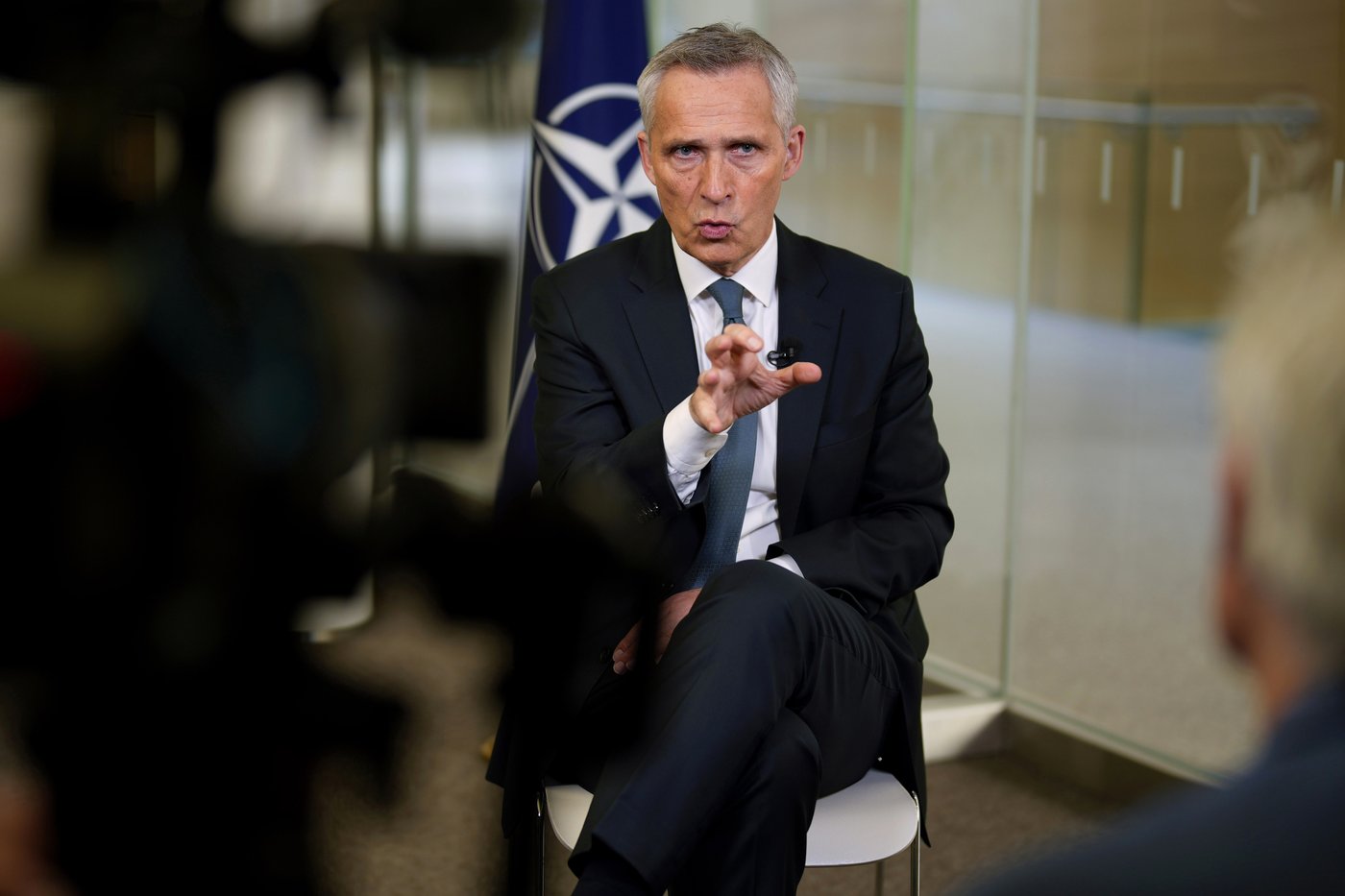NATO wants to fight climate change. Its chief tells AP the trick is to ...